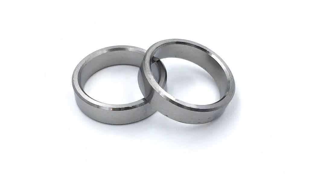 Custom 440C Precision Machined Shaft Bushings - Machined Hardware Source